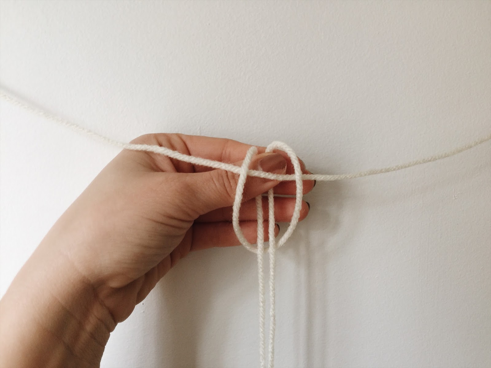 DIY yarn wall hanging