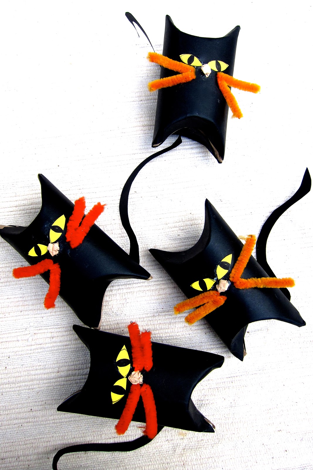 Como hacer un gato en material reciclable - Imagui