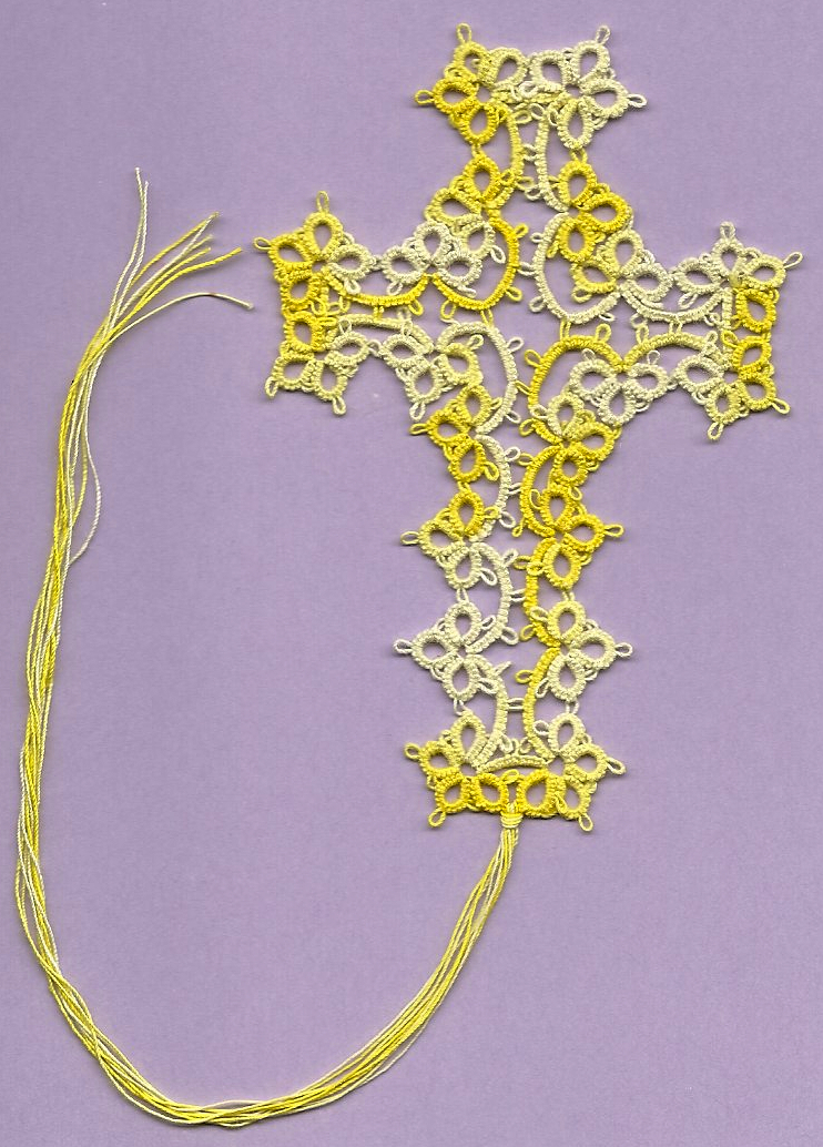 Taming Roses: A Pretty Cross using Clover motifs...