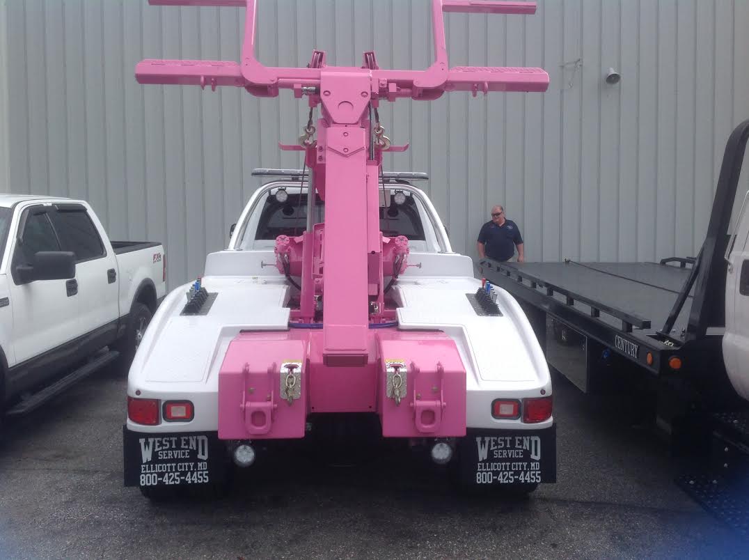 George's Custom Towing: Pink is the new Red.