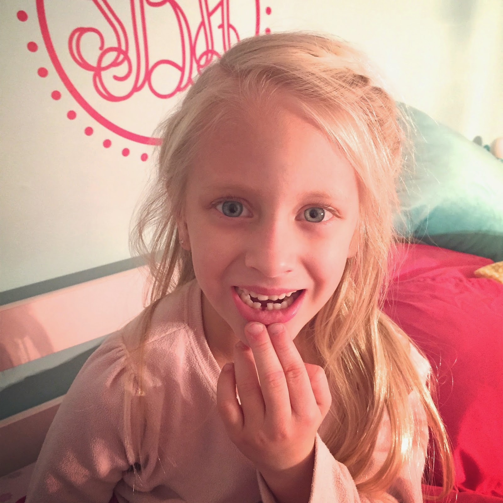 Beyond Our Wildest Dreams: Sophie's first loose tooth