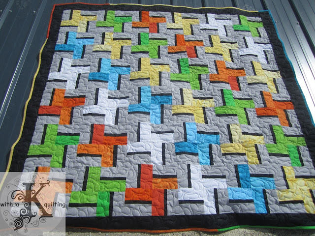 with a K quilting: Timothy School - Autism Awareness