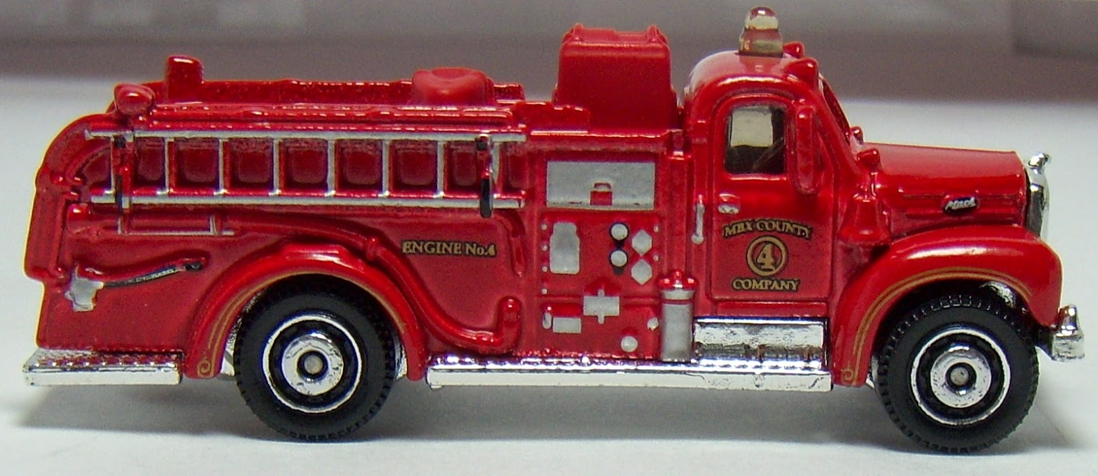 Matchbox 1963 Mack Model B Fire Engine and Seagrave Fire Truck