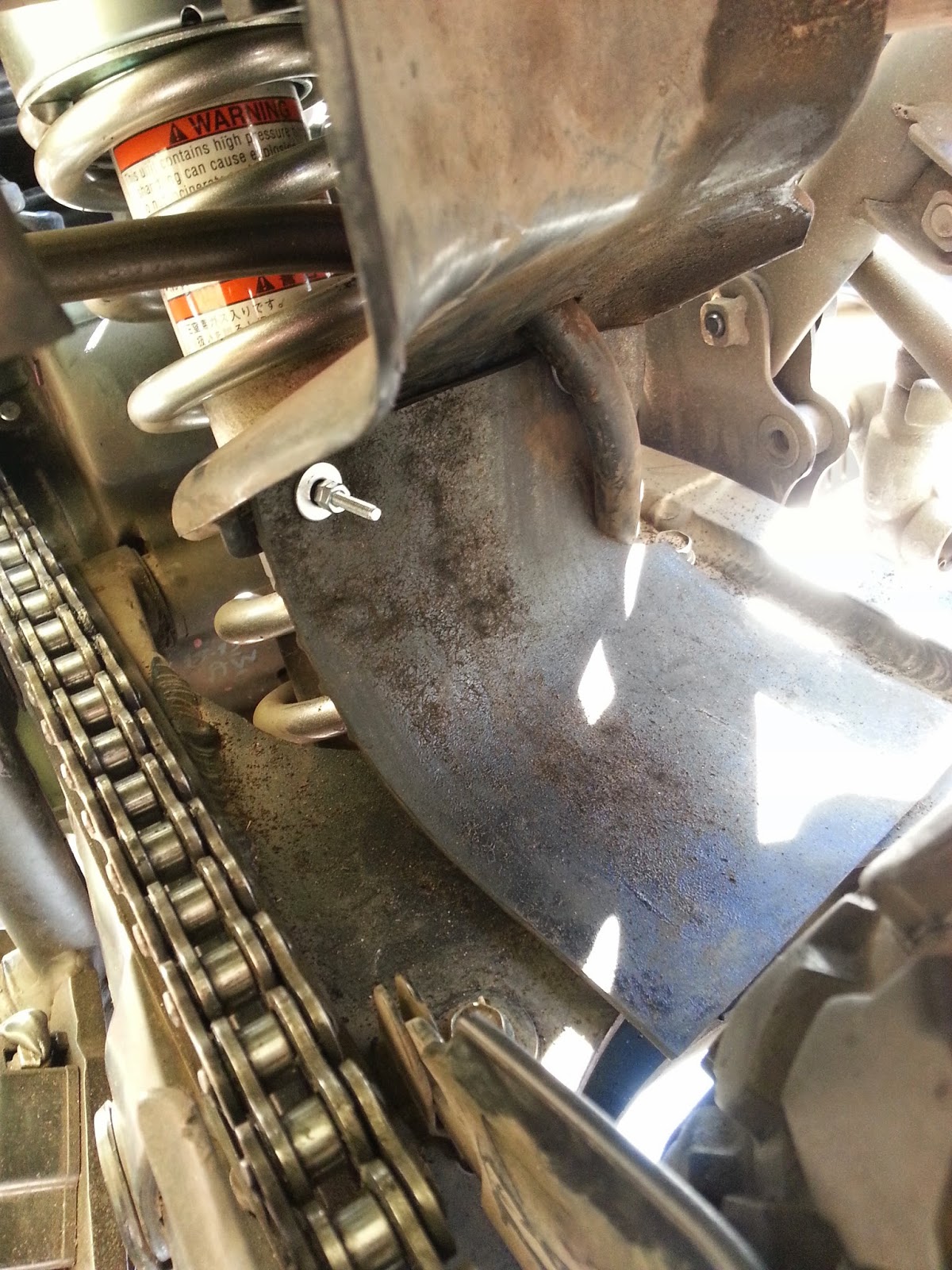 My KLR 650 Mods and farkles: KLR650 Rear shock mud flap