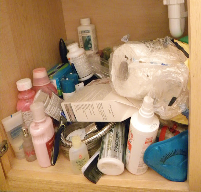 Growing the home: Spring cleaning {organizing a bathroom cabinet}