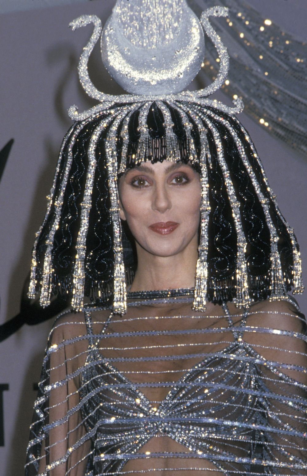 Curls, Mullets, Wigs, and Great Lengths: Here Are 10 Cher's Most Iconic ...
