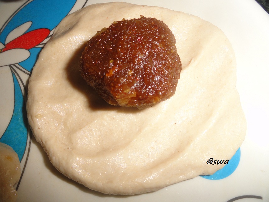 yummy food: Coconut oligalu or Coconut bhakshyalu