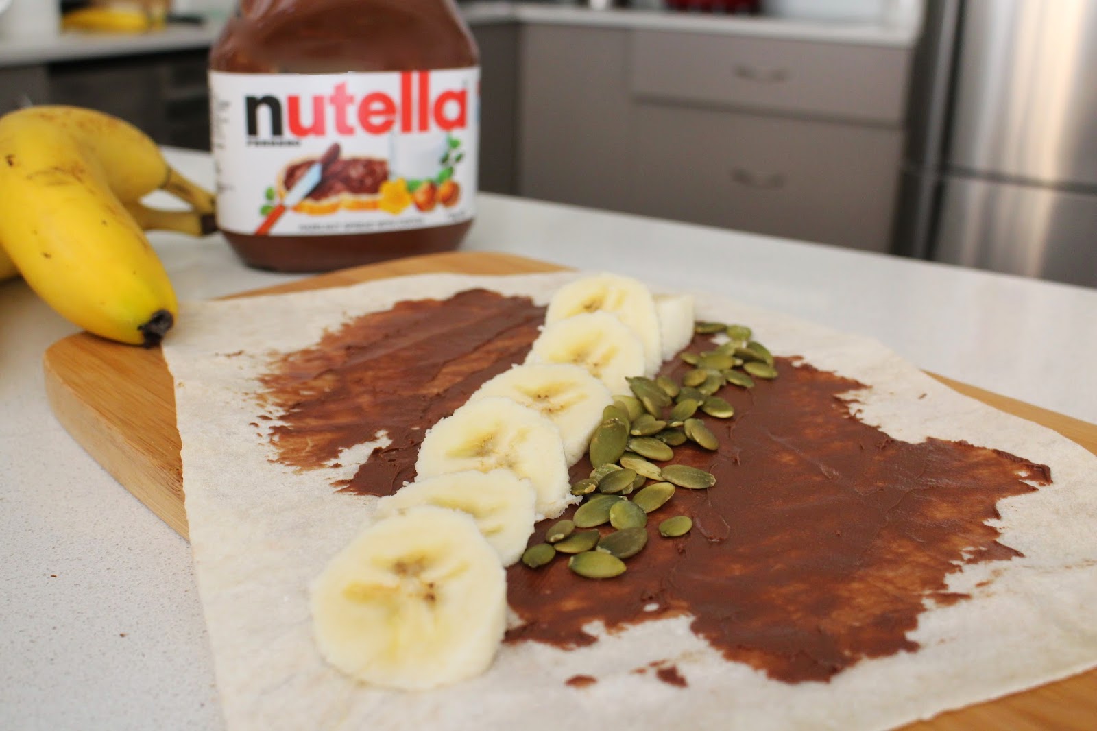 Healthy Nutella Wrap w/ Banana & Pepitas
