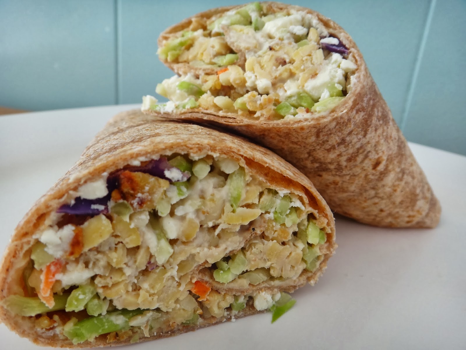 Tahini Tempeh Wrap with Hummus, Feta and Broccoli Slaw