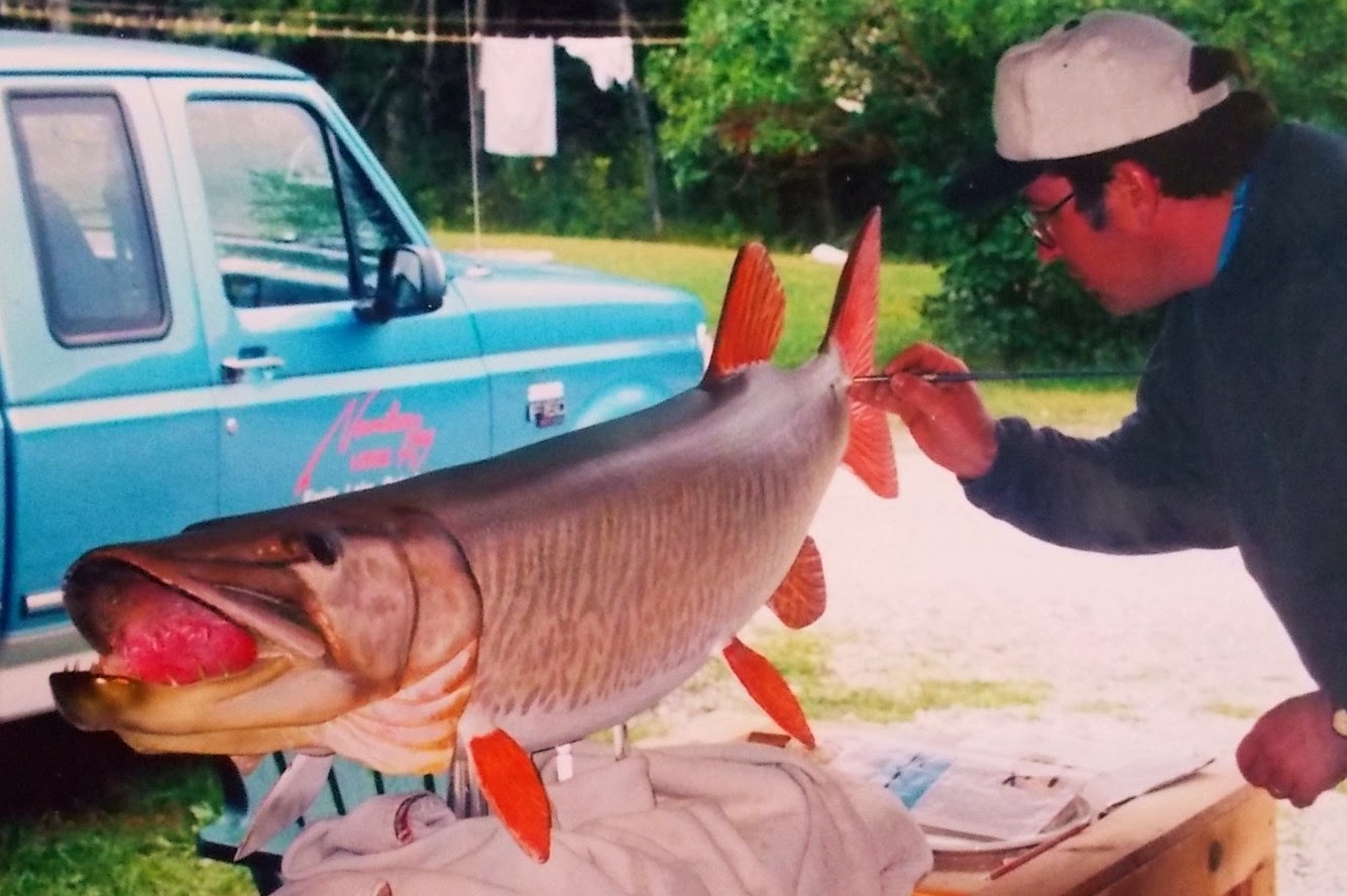 CHARLES WEISS ART: Repainting a wood carved Muskie at Vermilion Bay ...