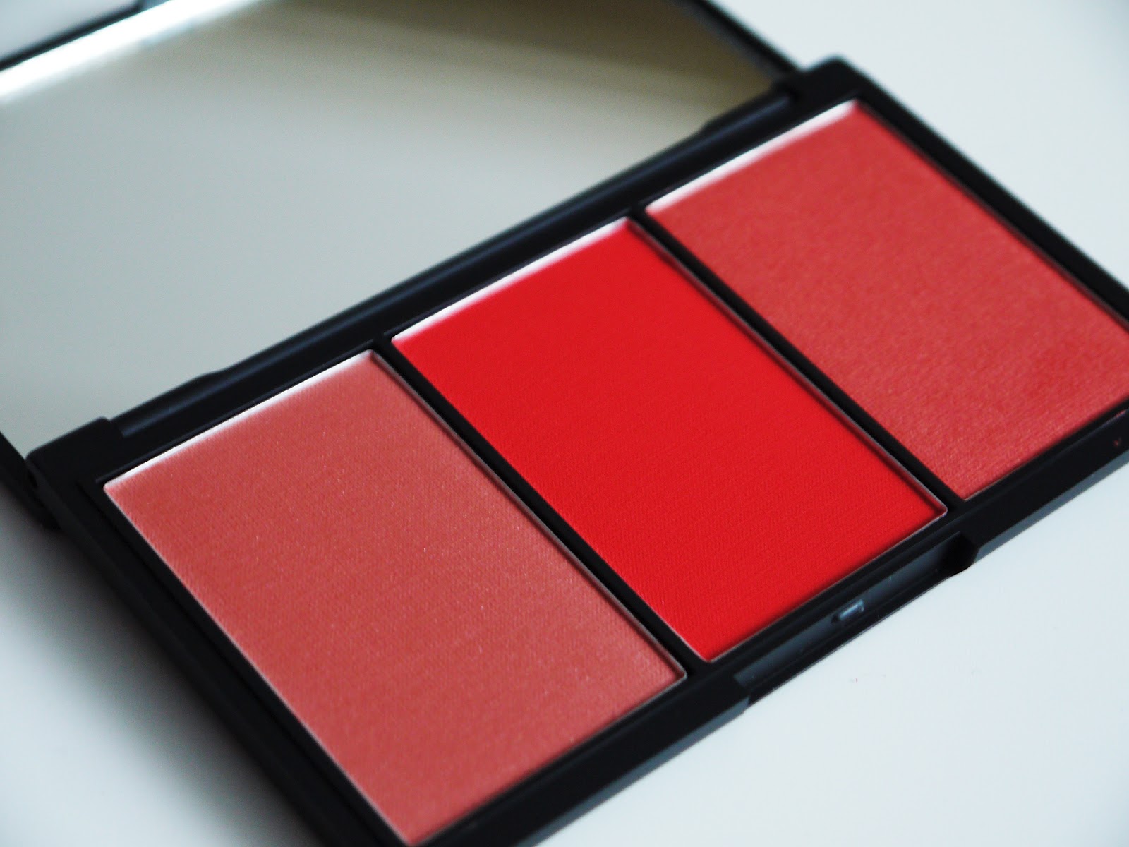 Sleek makeup's blush by 3 in FLAME, stunning red blushes, need, need ...