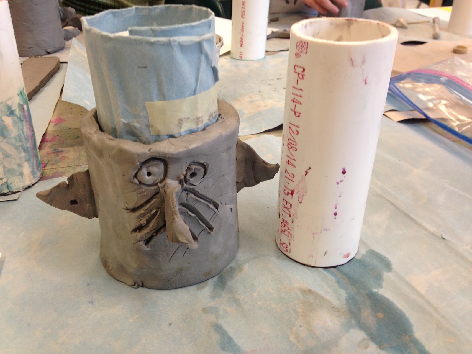 Art Room Blog: Totem Poles in Clay 2nd Grade Project...