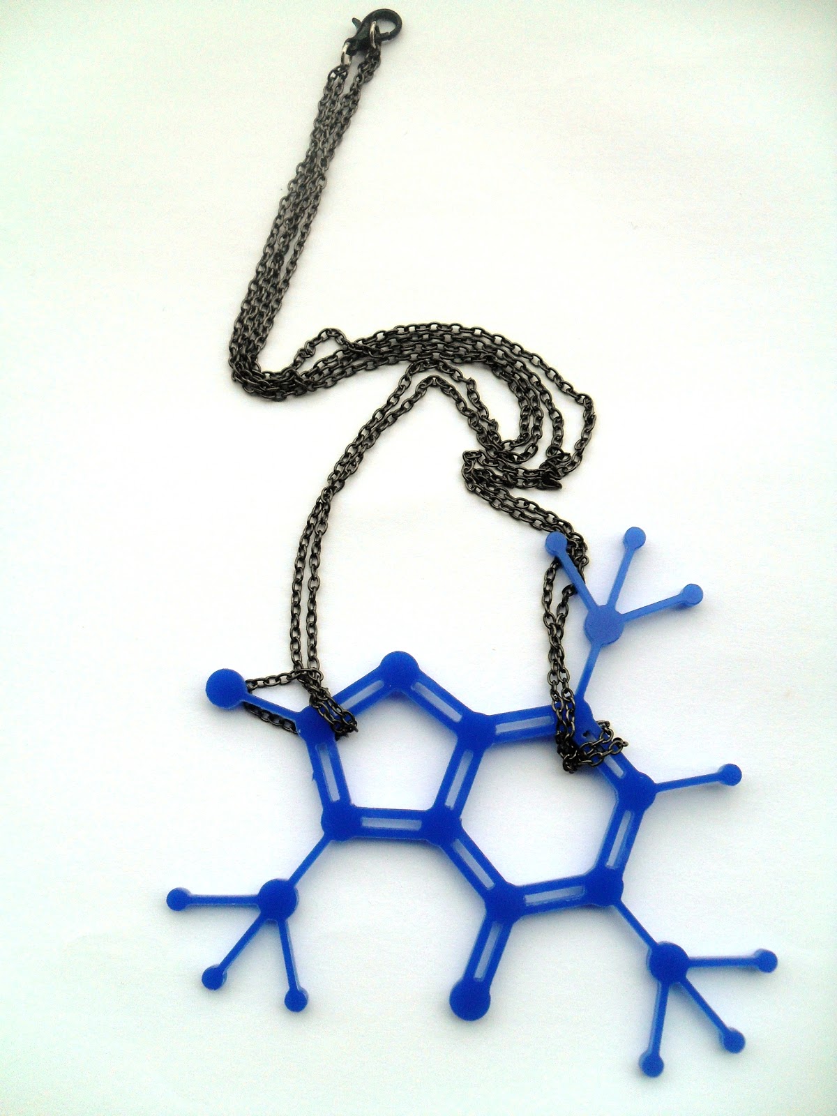 CRAFTWOMEN Studio: C8H10N4O2 Necklace in Blue