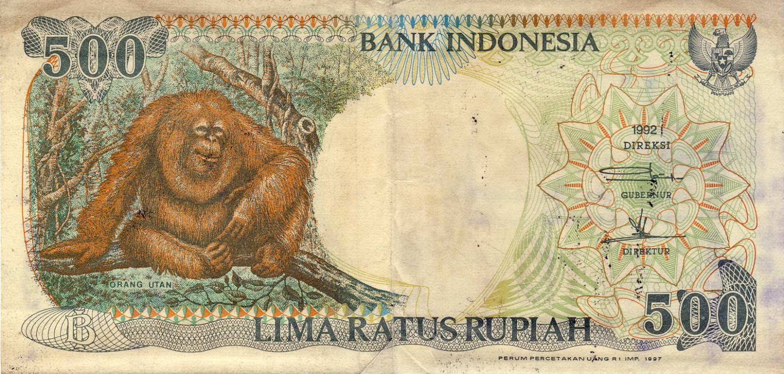 Uang Kertas 500 Rupiah Orang Utan – Rumah Adat Kalimantan Timur