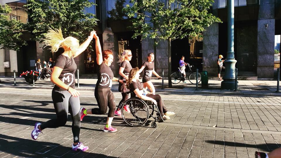 A wheelchair user in the women's run