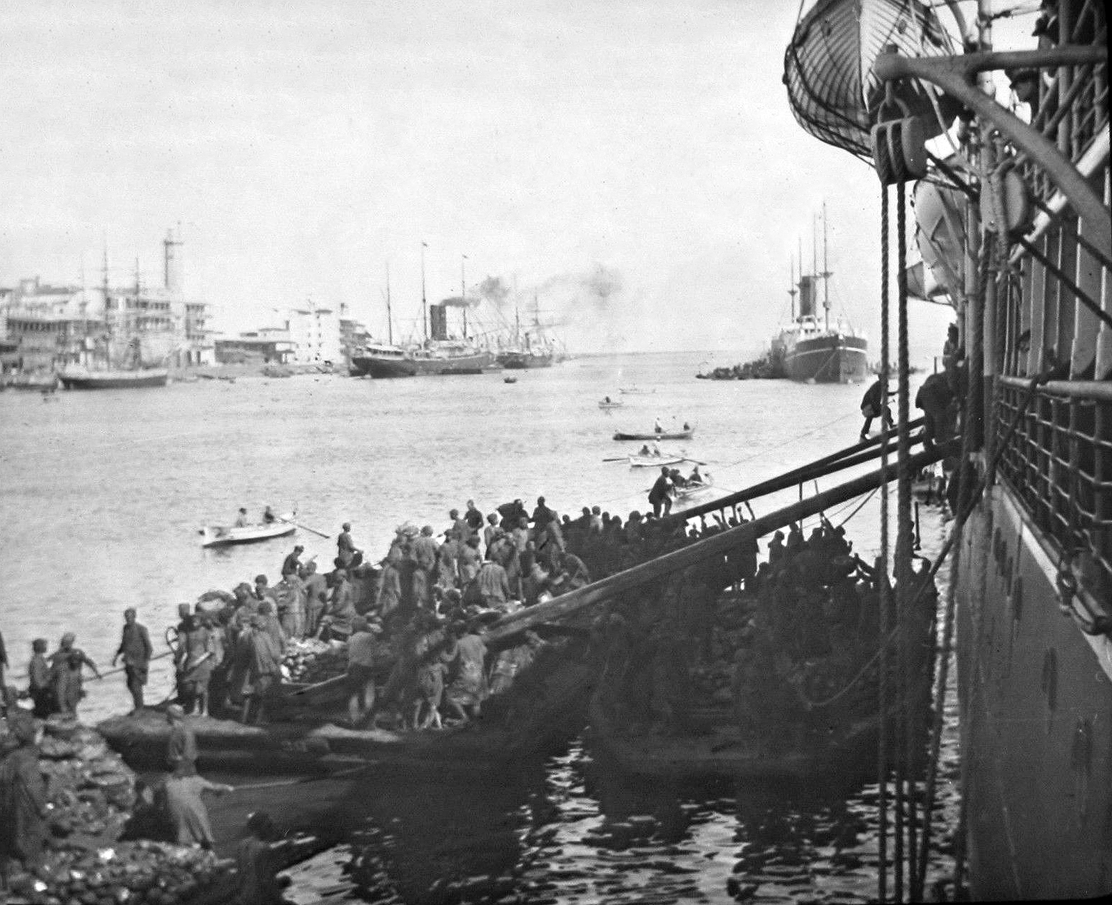 transpress nz: loading a ship in Port Said, Egypt, circa 1900