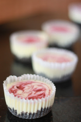 From Scratch: Mini Raspberry Swirl Cheesecakes