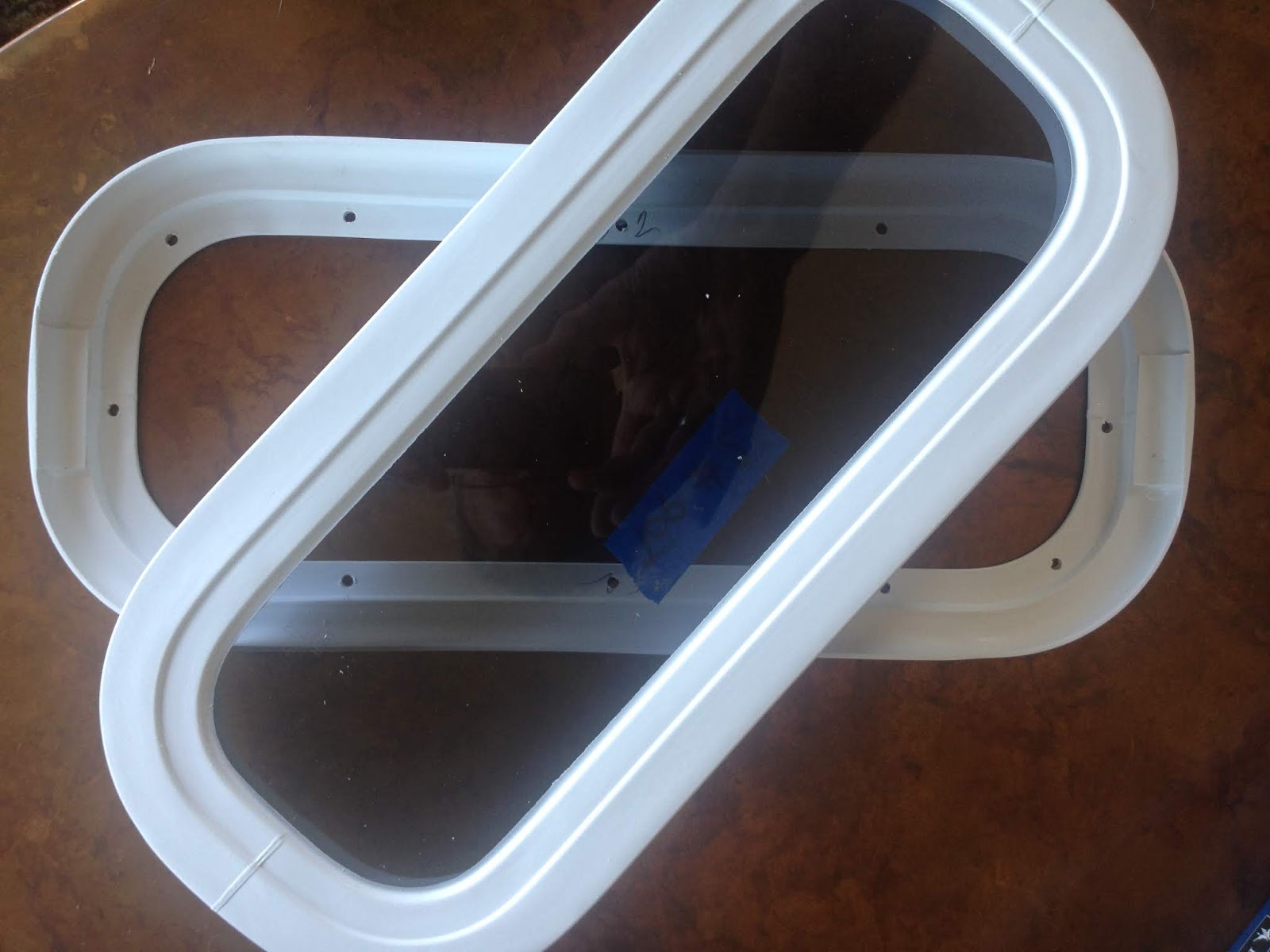 Peregrine Charters: Portlights and window coverings