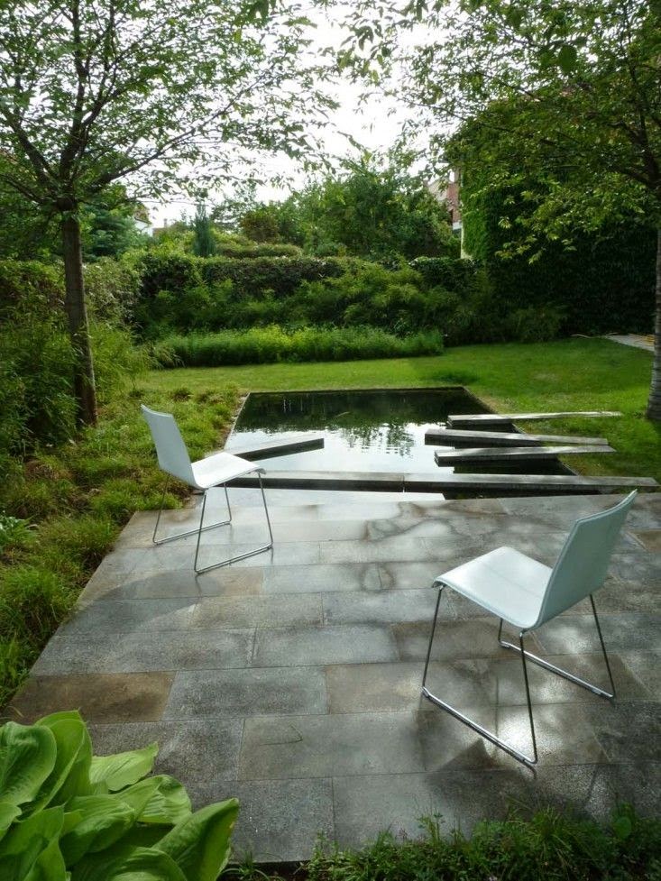 Contemporary water feature at the edge of a patio