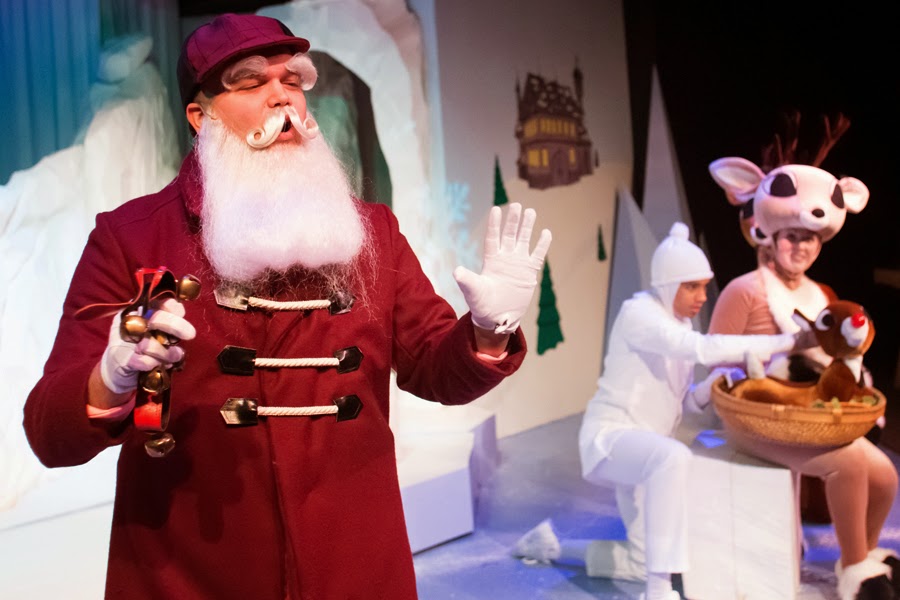 Left to right: Zachrey York (as Santa™), Ty Carter (as Baby Rudolph ...