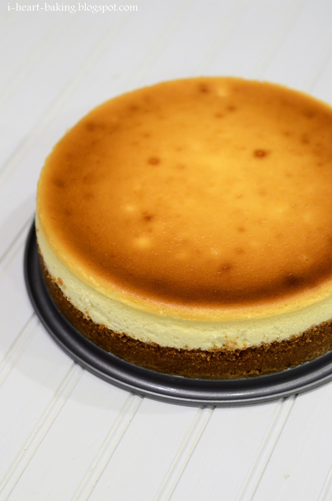 I Heart Baking Classic Cheesecake Decorated With Whipped Cream And Strawberries