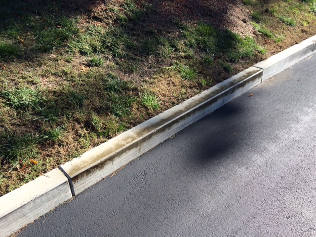 Concrete Existence: Wax v. Enamel v. Lacquer (Wax Wars: A New Curb)