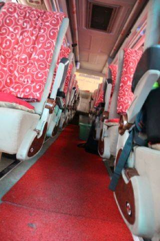 SEWA BUS PARIWISATA : SURYA BALI FIRST CLASS SERVICE
