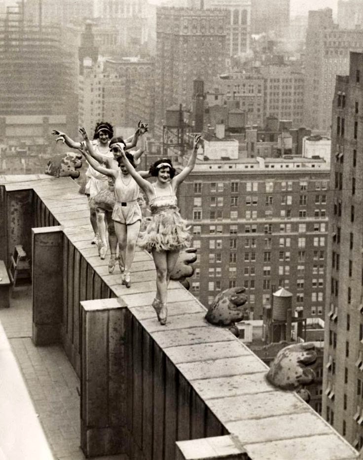 Four ballerinas dancing freely on the edge of a skyscraper in New York ...