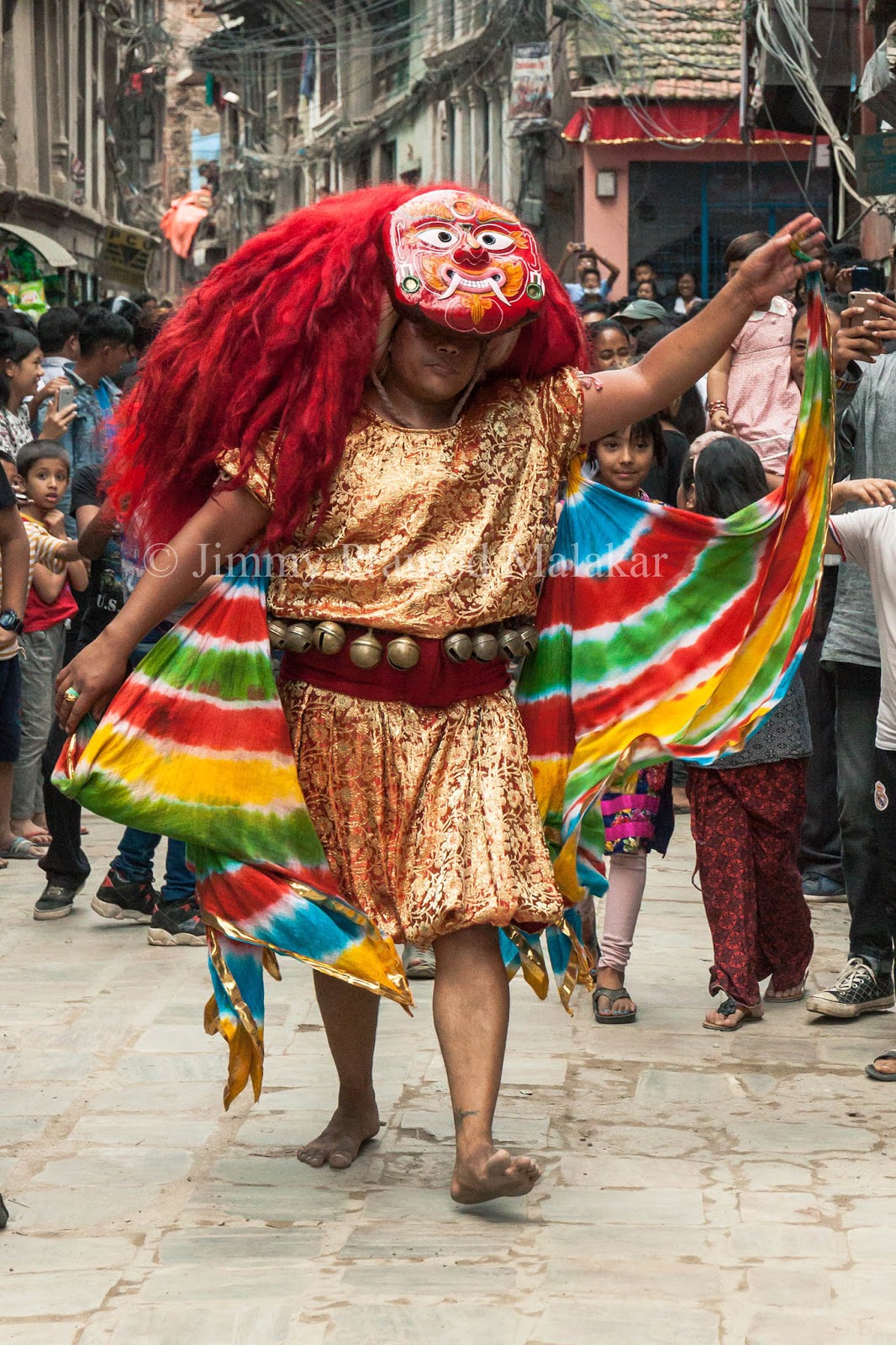 A View Through Jimmy Malakar's Lense: A mask dancer dressed as the ...