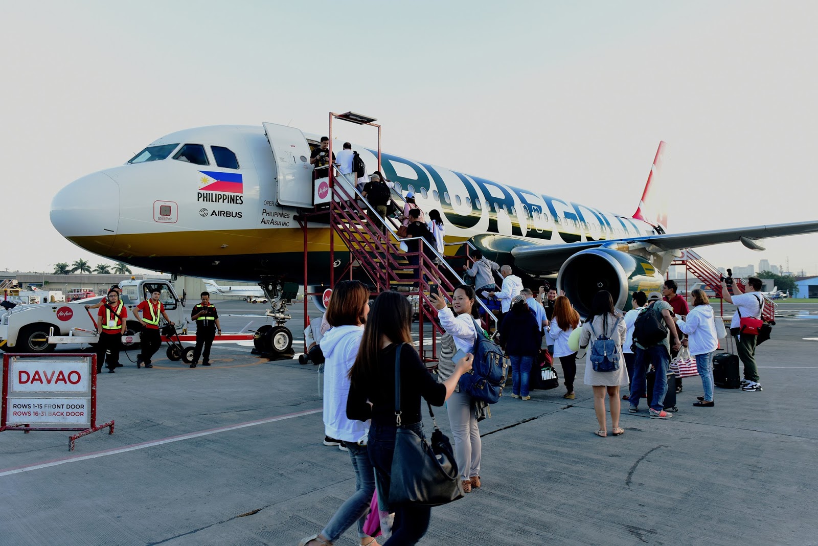 Puregold unveils second plane livery in partnership with AirAsia Lucky ...