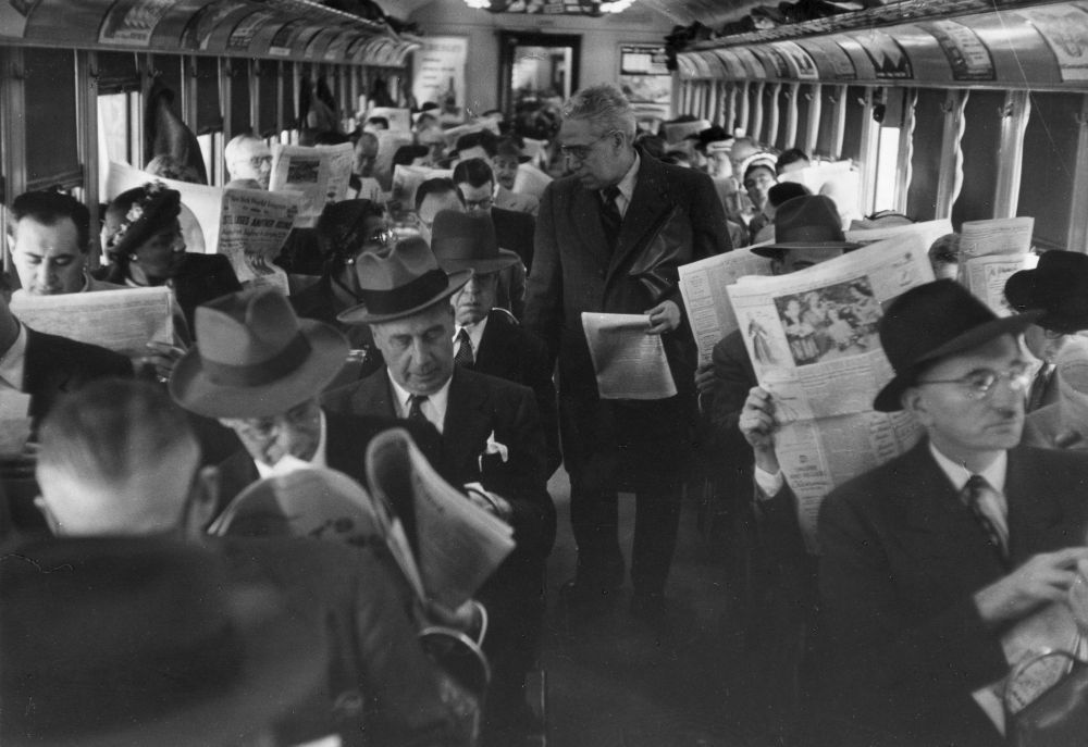 Young People Reading Newspapers
