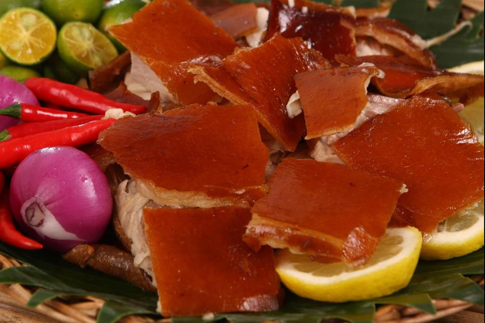 Why do Filipinos love Cebu Lechon during celebrations?