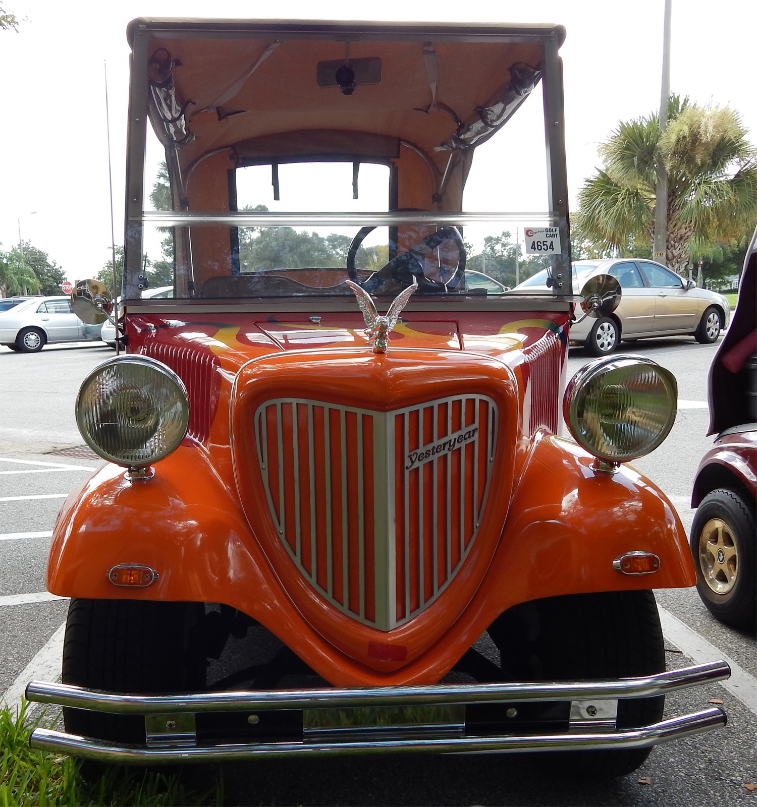 Yesteryear flamed-out custom Club Car golf cart with wooded dash in Sun ...