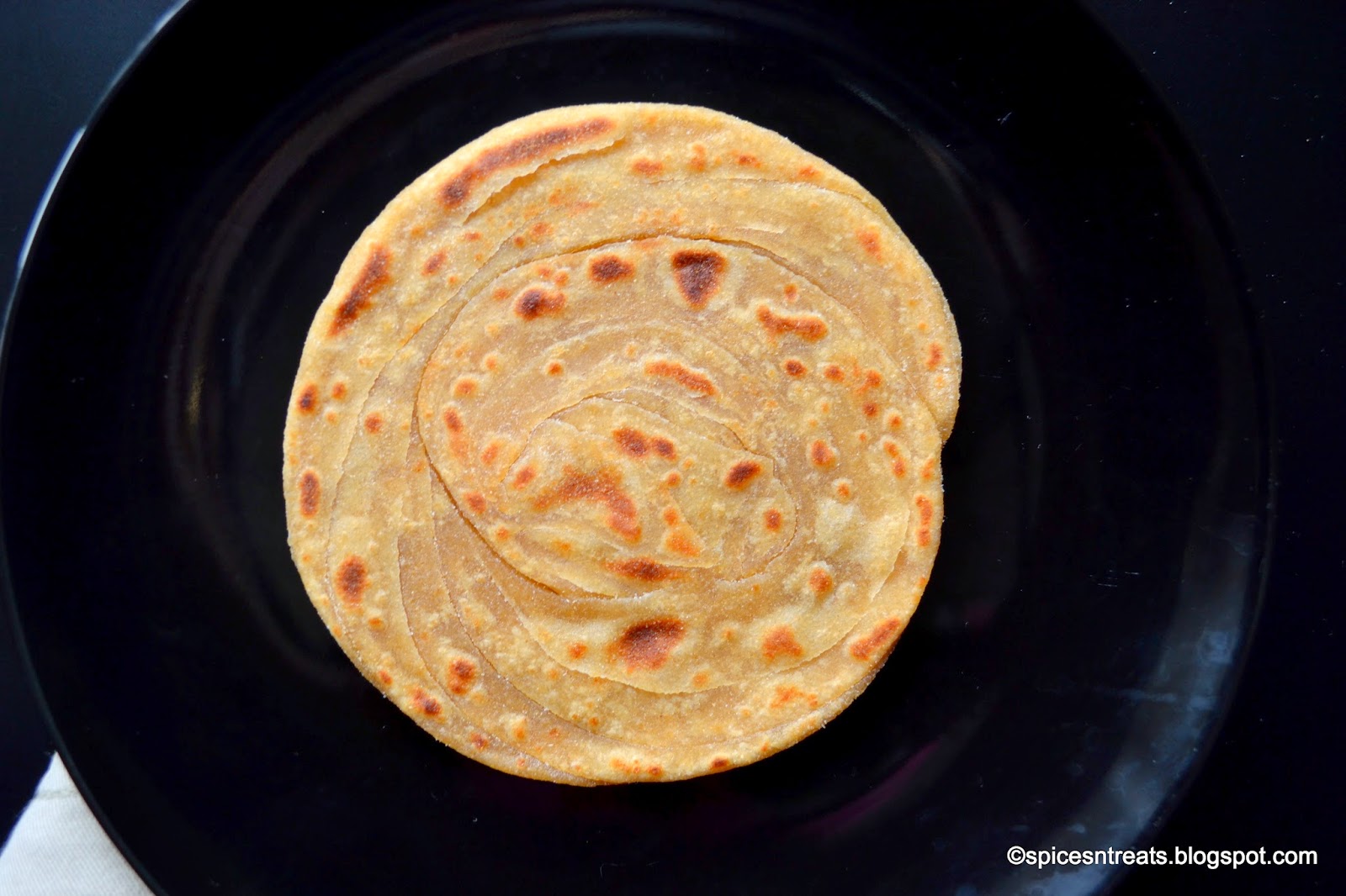 Spices and Treats: Whole wheat lacha parata | Veechu Parota