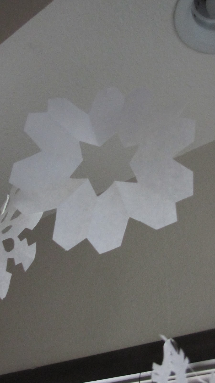 Adventures in DIY: Paper Snowflakes: Pinterest Addiction #3