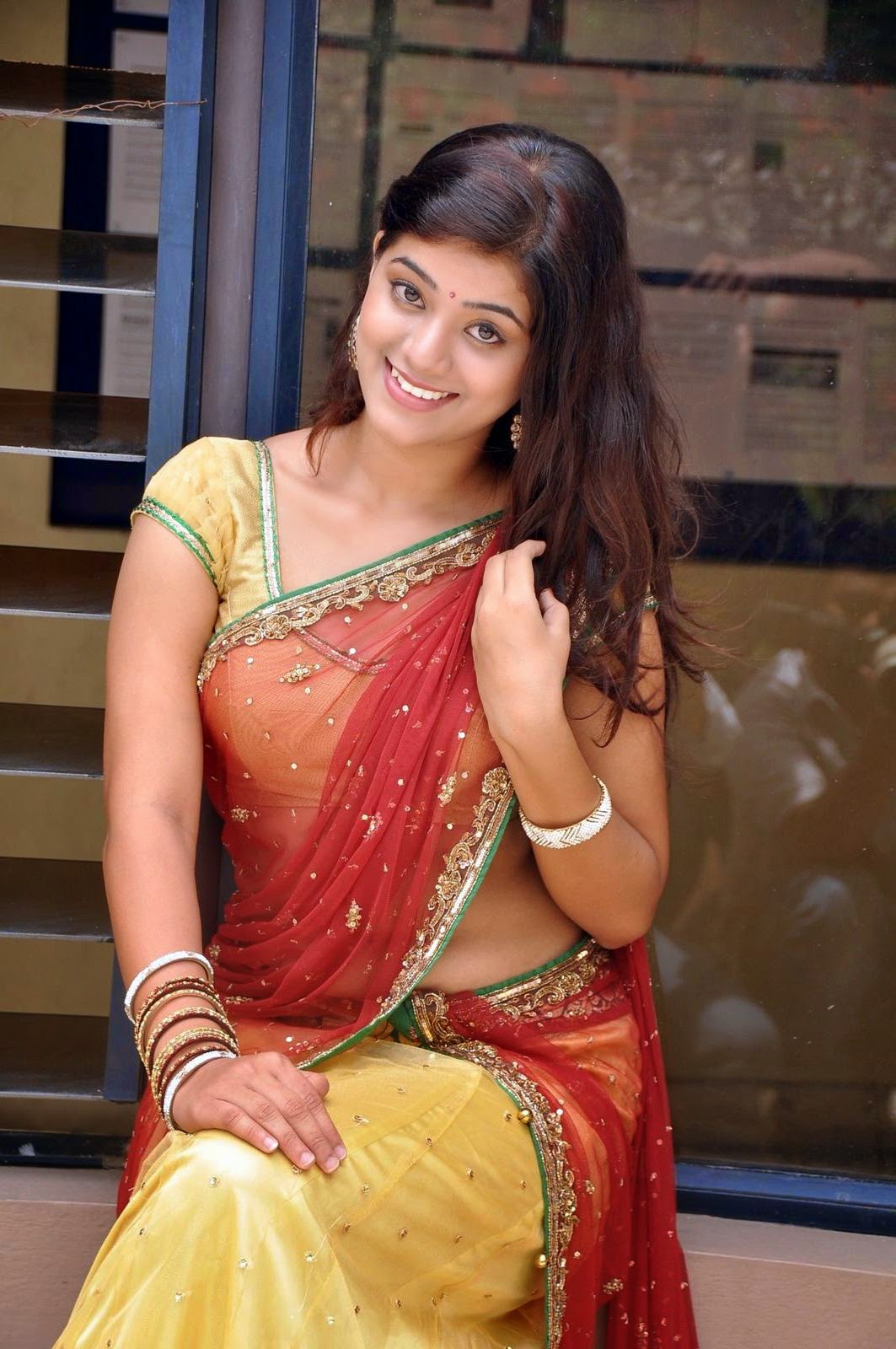 Yamini Bhaskar Navel Show Stills In Half Saree Cine South