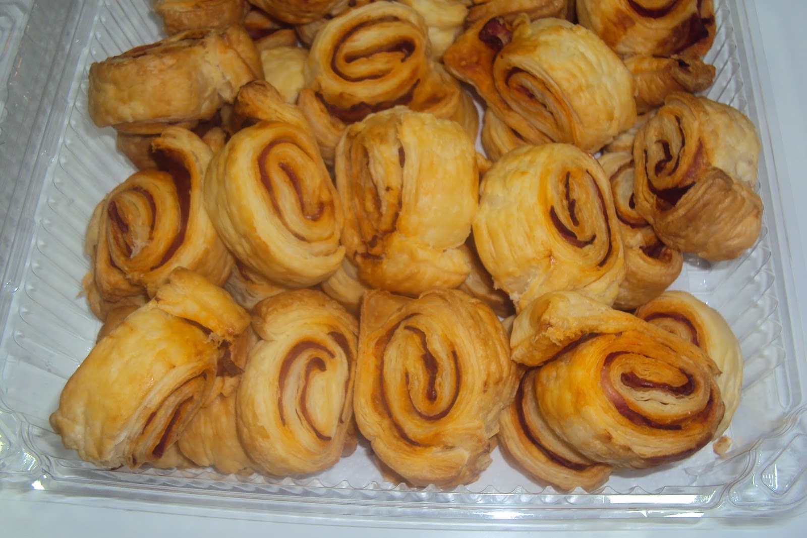 Cantinho da Zezinha: Caracois de massa folhada com chourição alentejano