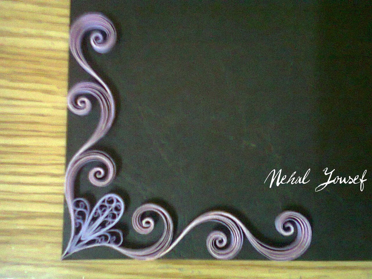 Nehal Quilling: purple swirls