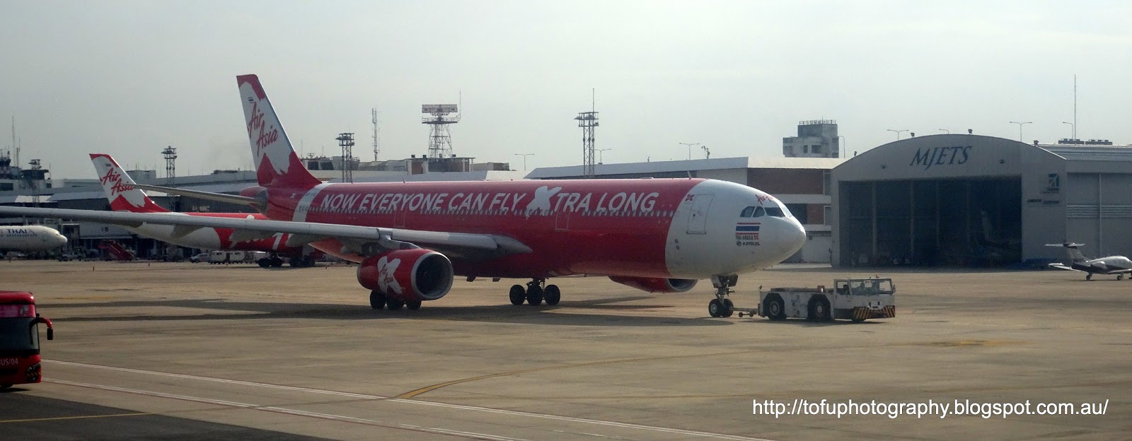 Tofu Photography: An Air Asia jet on the runway in Don Muang Airport ...