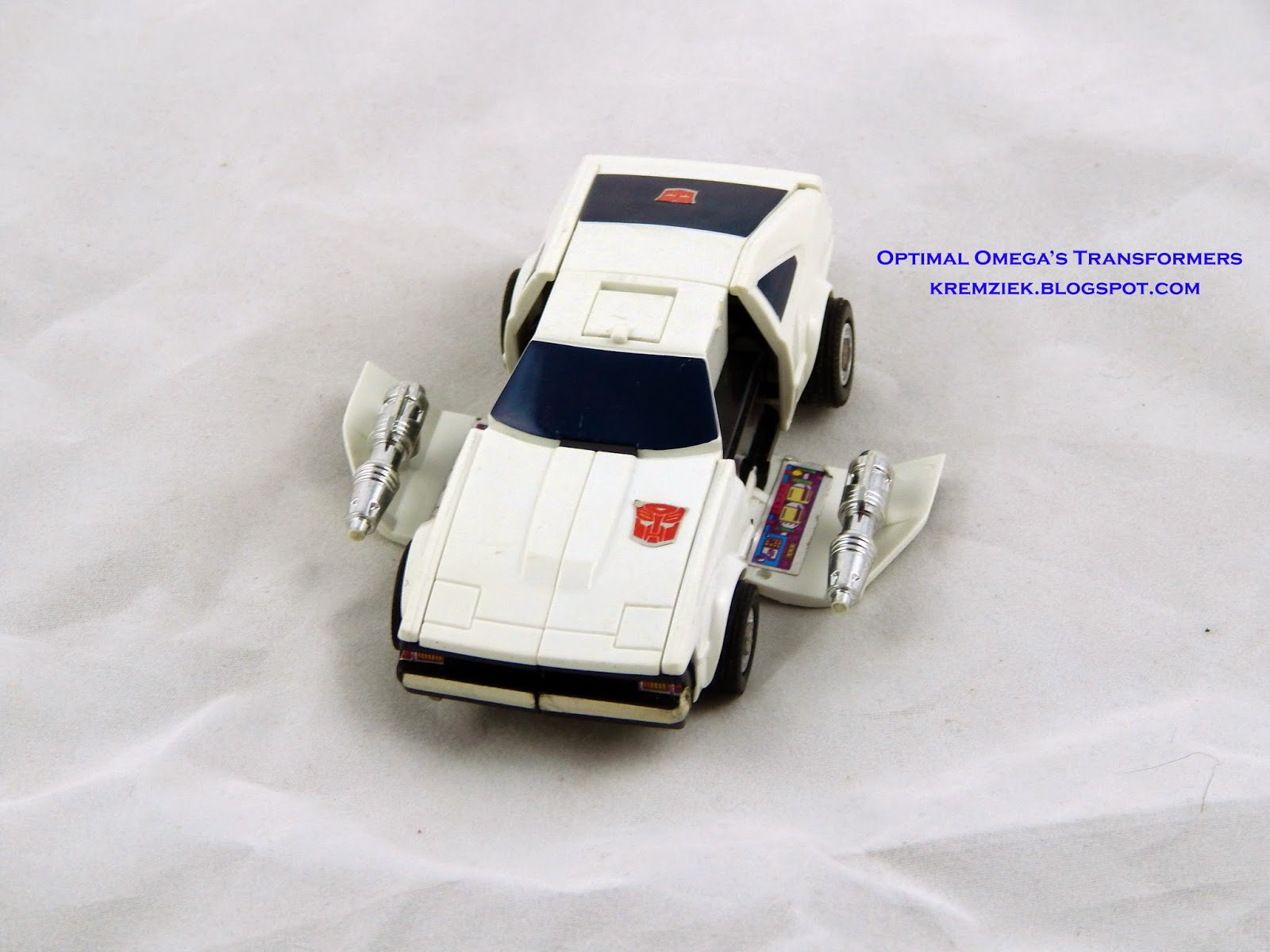 Optimal Omega's Transformers: Omnibot Downshift