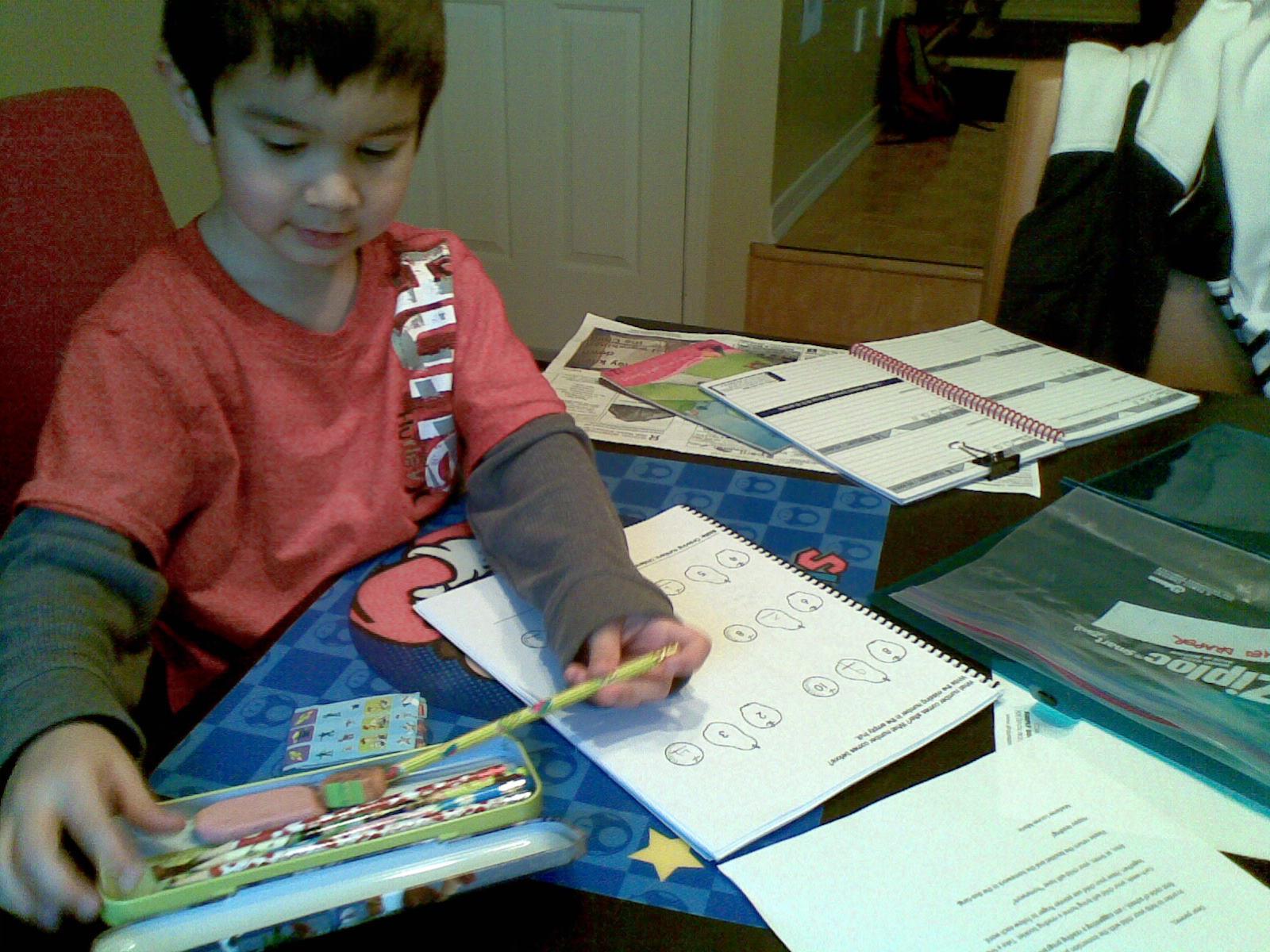 Photo and Video Album: James' first real homework from school