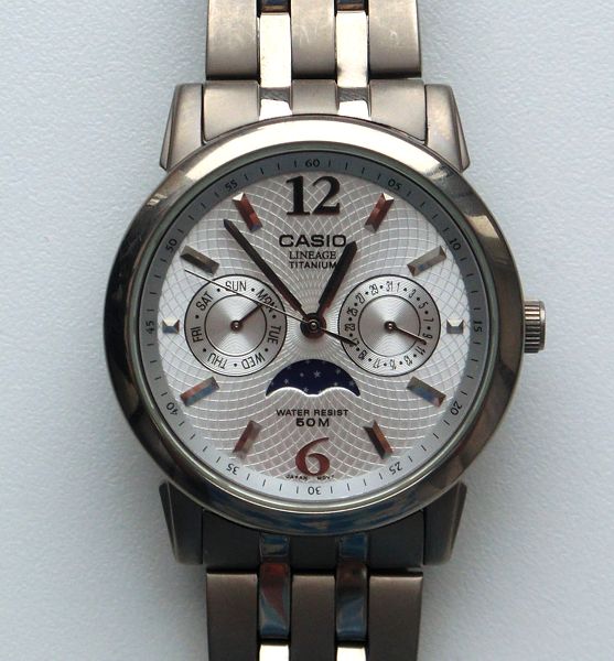 [Question]Any such thing as a white face dress watch with a moon phase ...