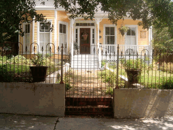 A Rustic Garden: Antique Iron Fencing Adds Old World Charm