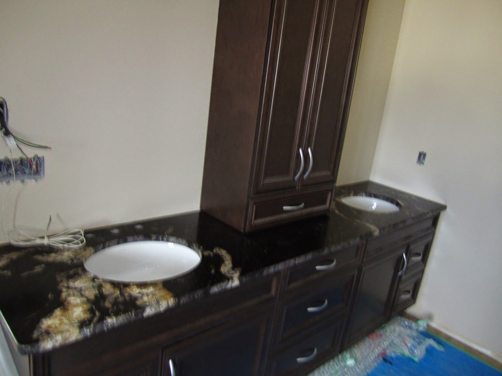 Building an infill in Westmount: Granite and baseboard!