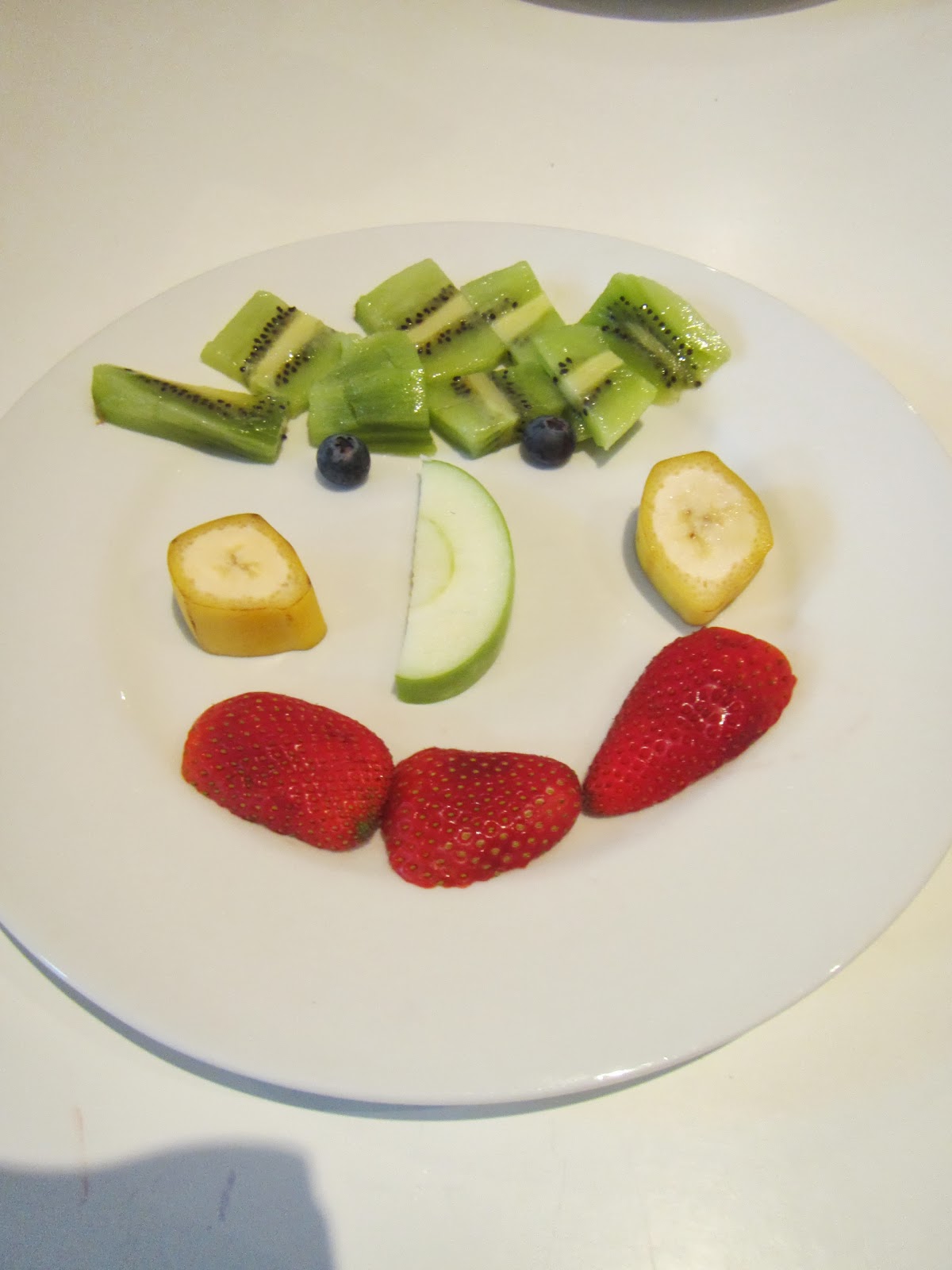 Crafty little people: Fruit faces