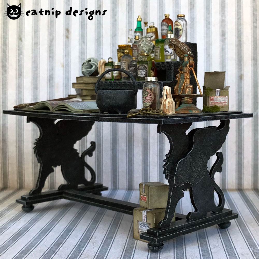 artistic catnip: a Wizard's potion making table...