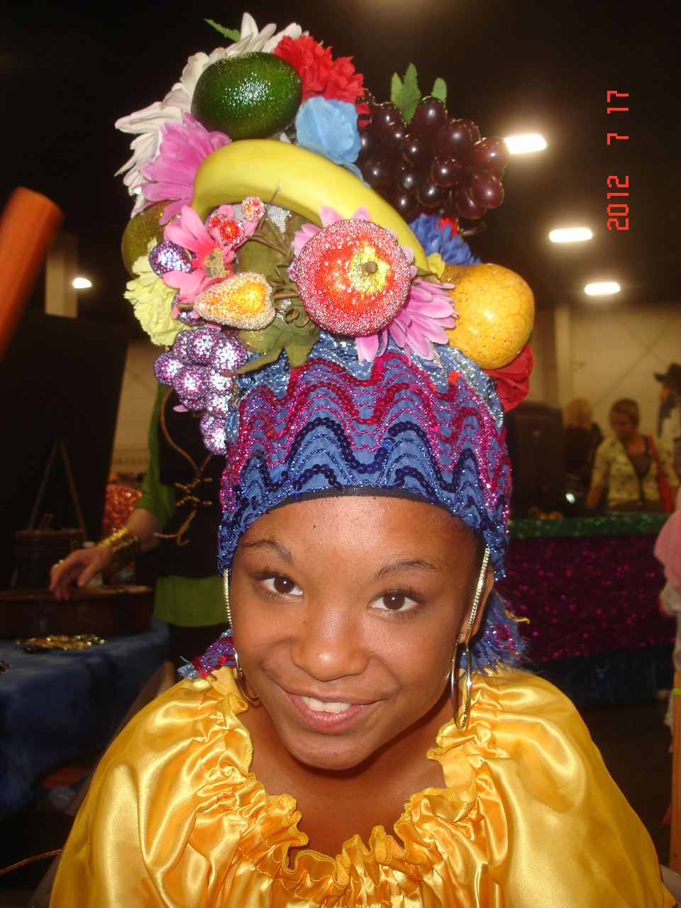 CHILDREN’S CAMPUS: A girl with fruit on her head!