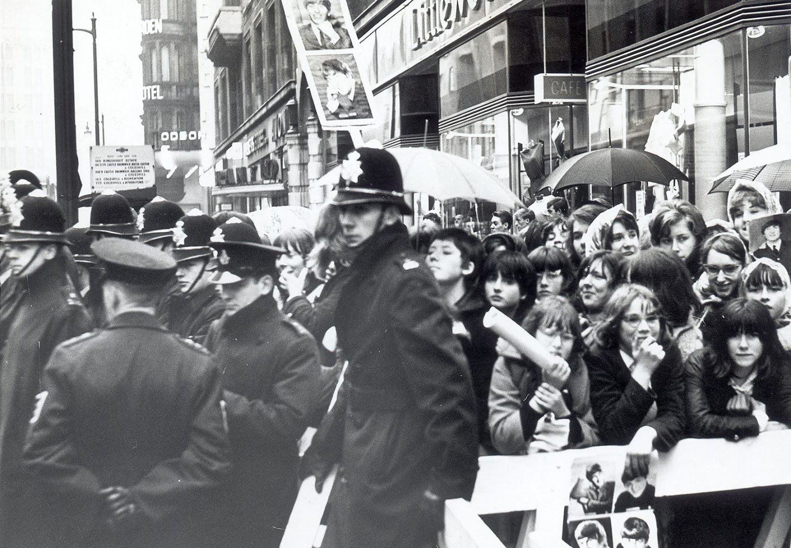 Meet the Beatles for Real: police, umbrellas and Beatlemania