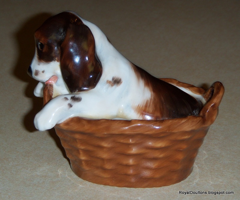 royaldoultons: ROYAL DOULTON FIGURINE COCKER SPANIEL DOG IN BASKET HN2586