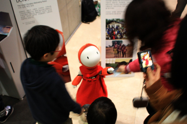 DONA is a donation-soliciting robot who begs for money